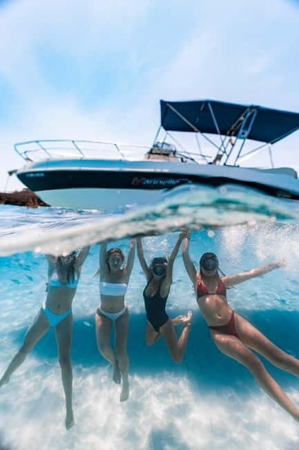 Exclusive motor boat Tour from Port of Ciutadella - The Sum Up