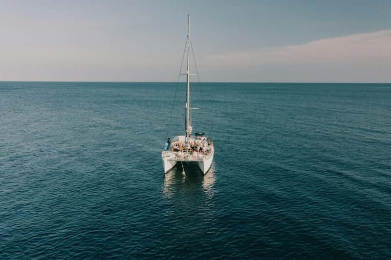 Excursion to Isla Mujeres, transportation, snorkeling, food, catamaran - Key Points