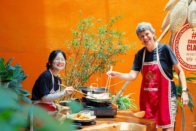 Experience Hanoi Cooking Class with Free Wine Tasting - Key Points