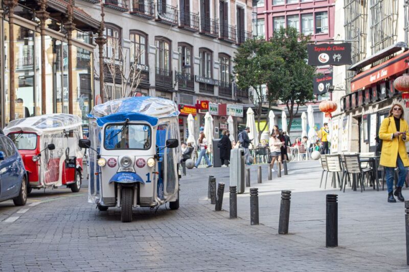 Explore Madrids Top Sights on an Electric Tuk-Tuk Tour - The Sum Up