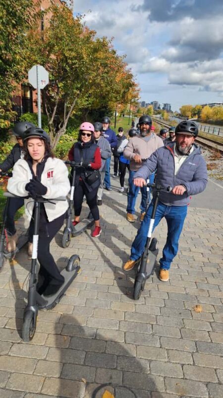 Explore Old-Montreal with easy to use e-scooters - The Comedy Element and Guide Expertise