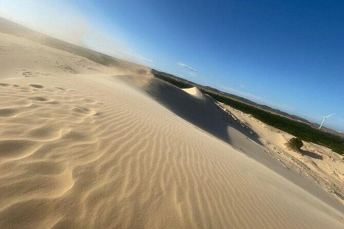 Explore Secret Mui Ne: Guided Jeep Tour through Scenic Spots - Visiting the Fishing Village