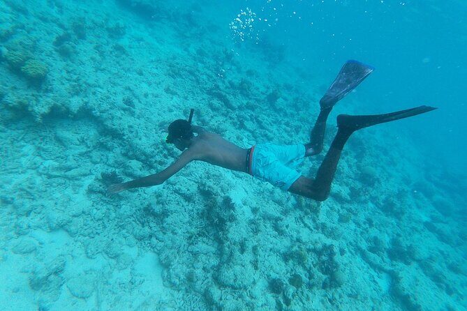 Explore Seven Mile Beach Your Way with Jet Ski Experience - Safety and Practical Tips