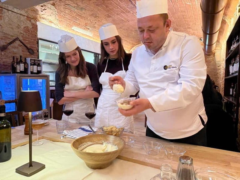 Florence: Golf Cart Tour & Cooking Class with Unlimited Wine - Landmark Highlights and Hidden Gems