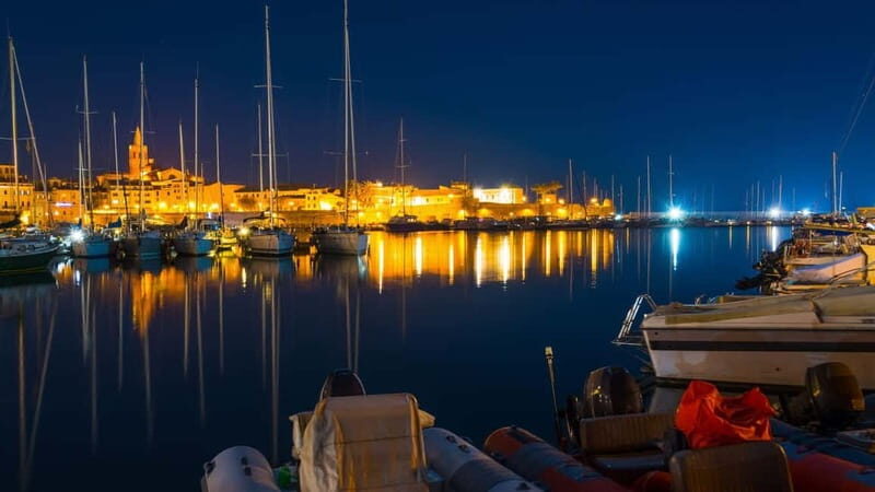 From Alghero: sunset on a sailing boat with aperitif - Swimming Under the Stars