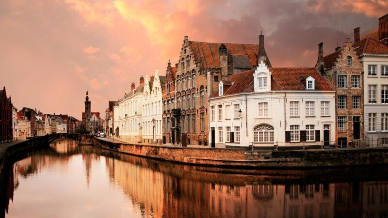 From Amsterdam: Day Trip to Bruges in Spanish - Practical Details: Transportation, Cost, and Inclusions