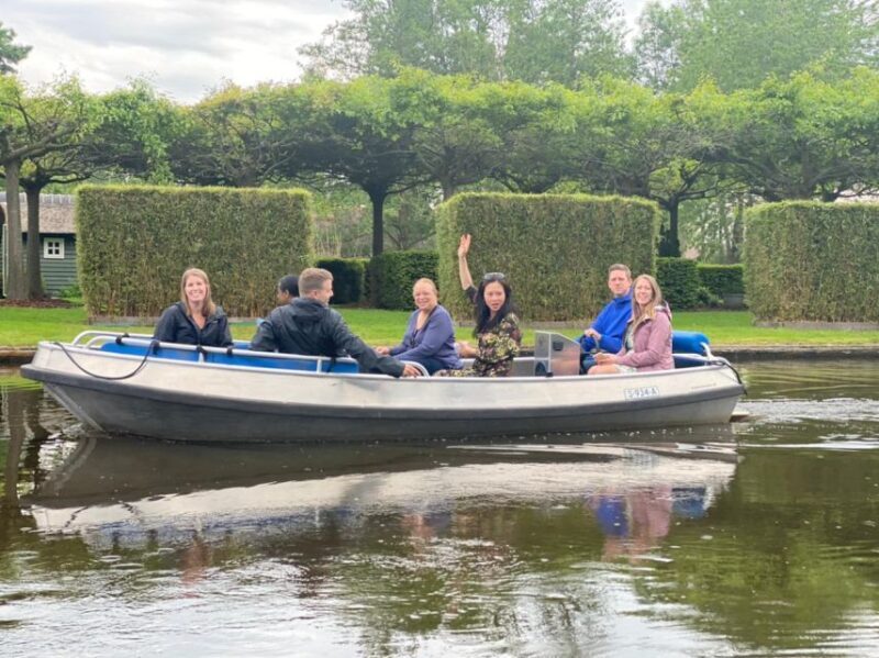 From Amsterdam: Giethoorn Day Trip with Small Electric Boat - Exploring the Village on Foot or Bike