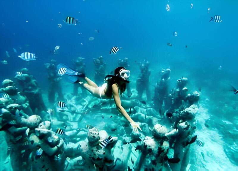 From Cancun: Isla Mujeres by Luxury Catamaran with Drinks - An Engaging Journey on the Water