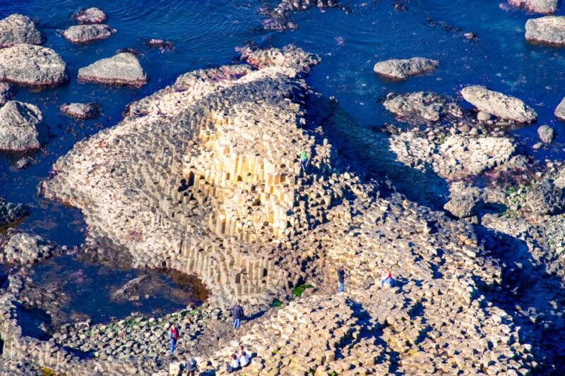 From Dublin: Giant's Causeway & Belfast Titanic with Ticket - Dunluce Castle and Dark Hedges