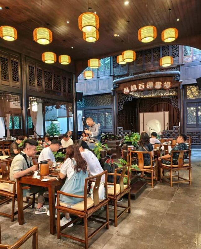 From Hangzhou: Wuzhen Water Town Tour with Riverside Essence - FAQs