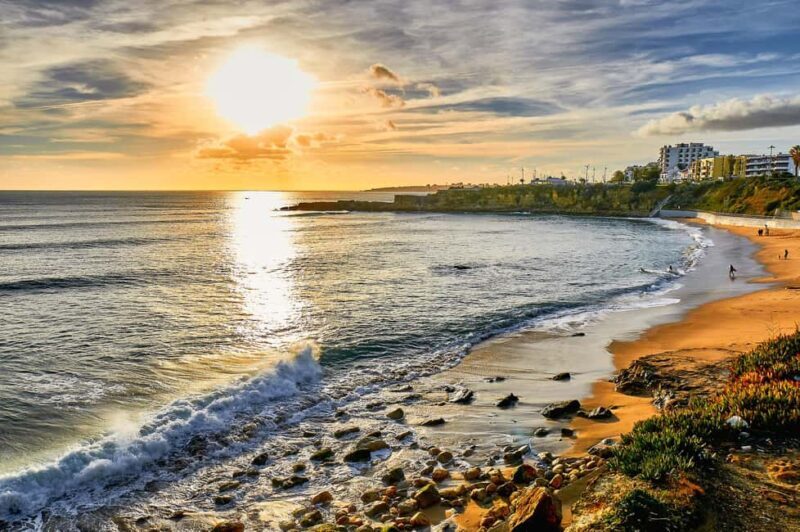 From Lisbon: Cascais Estoril Beach & Wine Pass - The Dazzling Cliffs of Praia da Bafureira and Ocean Views