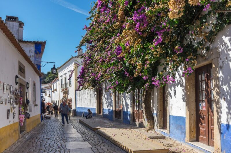 From Lisbon: Fátima, Nazaré, and Óbidos 8-Person Group Tour - Nazaré — The Coastal Wonder