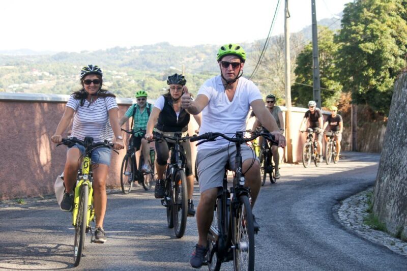 From Lisbon: Sintra to Cascais Full-Day Guided E-Bike Tour - Ascending to Peninha and Panoramic Views
