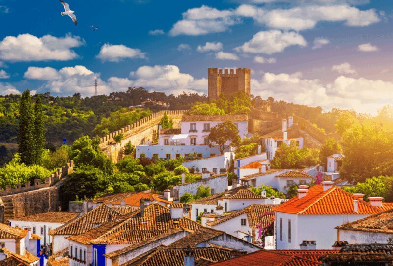 From Lisbon: Tour to Óbidos and Nazaré - Medieval Village, Sour Cherry and Iconic Beaches - Key Points
