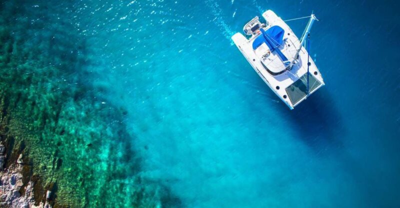 From Ornos: Mykonos Delos Catamaran Cruise with Meal & SUP - Detailed Breakdown of the Itinerary
