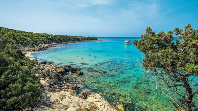 From Paphos: Baths of Aphrodite, Latchi & Blue Lagoon Cruise - Key Points