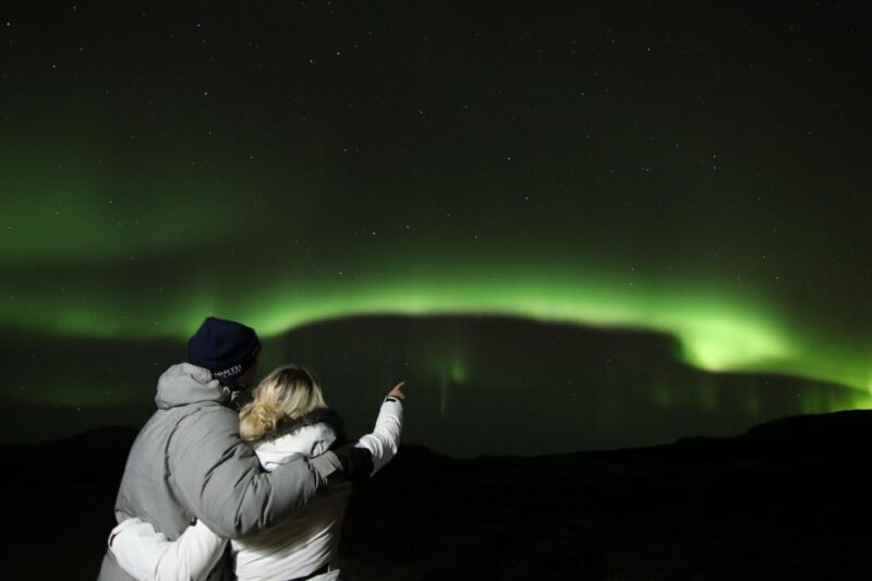 From Reykjavik: Northern Lights Tour with Hot Cocoa & Photos - Key Points: