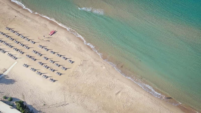 Full Day Pass to Cala Manbrù Beach Club - Key Points
