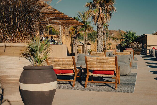 Full Day Pass to Cala Manbrù Beach Club - Who Should Consider This Experience?