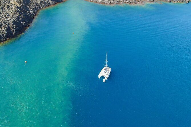 Full Day Santorini Catamaran Private Cruise with meal and transfer - Who Should Book This Tour?