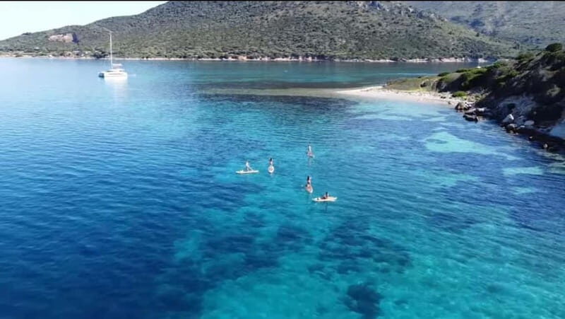 Golfo Aranci tour SUP Paddleboard Dolphin watching, aperitif - Discovering Sardinia’s Coastal Charm with a SUP Dolphin Watching Tour