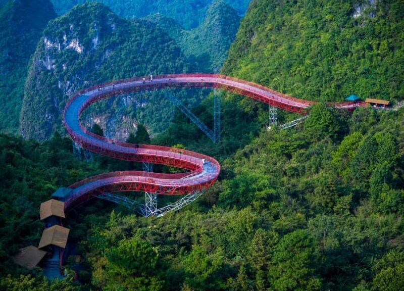 Guilin: Cave, Yulong Rafting, Glass-bottomed skywalk & Show - The Journey Begins: From Guilin to Reed Flute Cave