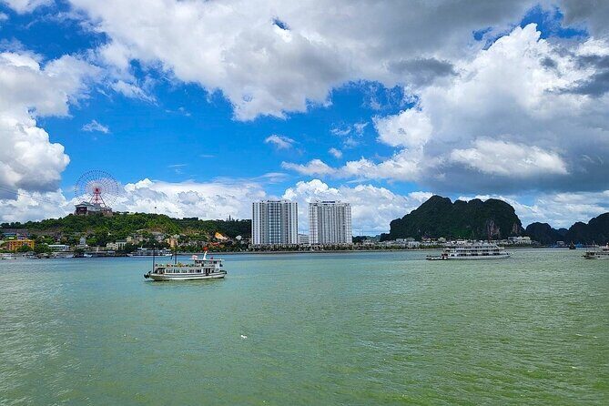 Ha Long Bay Sunset & Luxury Yacht Dinner with City Night Views - Weather and Cancellation Policies