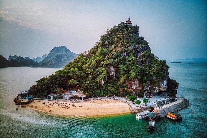 HaLong Bay Day Cruise with Kayaking, Swimming, Hiking and Lunch - Sunset, Relaxation, and Returning to Hanoi