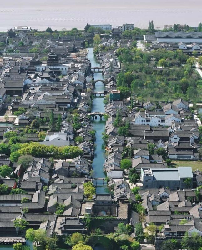 Hangzhou to Haining: Tide Park, Folk Museum & Shadow Puppet - The Itinerary in Detail: What Makes Each Stop Special