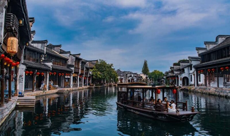 Hangzhou: Wuzhen & Nanxun Town Tour with Tea & Pingtan - Key Points