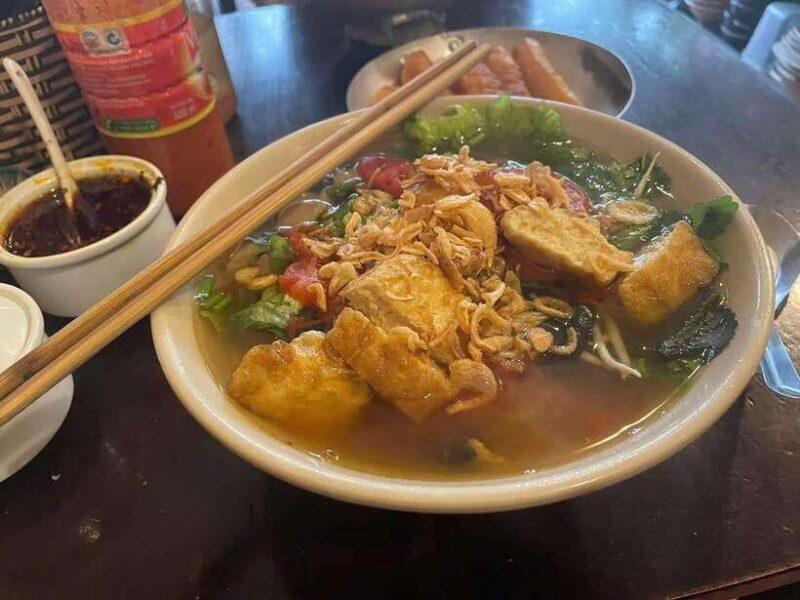 Hanoi Old Quarter Street Food Private Tour With Funny Guide - Walking Through Hanoi’s Nightlife and Iconic Spots