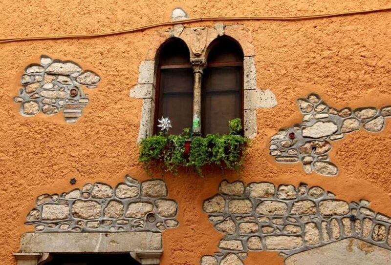 History, Curiosities, and Secrets of Rome's Garbatella District by Night - Key Points