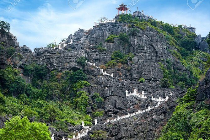 Hoa Lu -Tam Coc - Mua Cave Full Day Trip with Limousine Bus - Exploring Tam Coc’s Land-Based Halong Bay