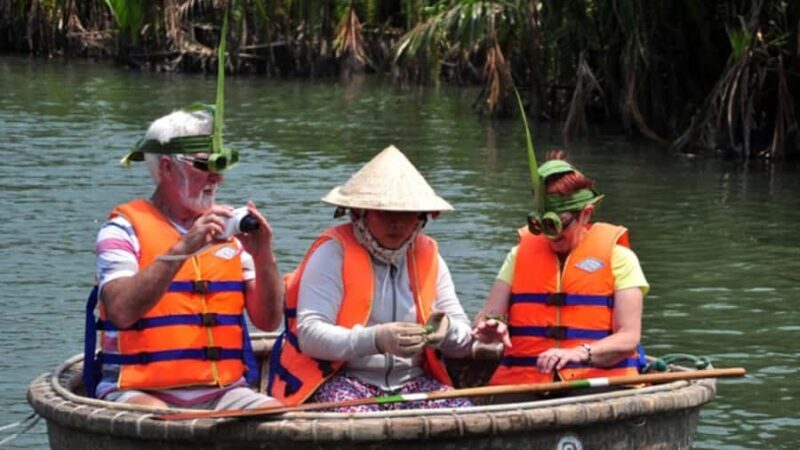Hoi An : Bamboo Basket Boat Ride & Lantern Boat Trip . - The Sum Up