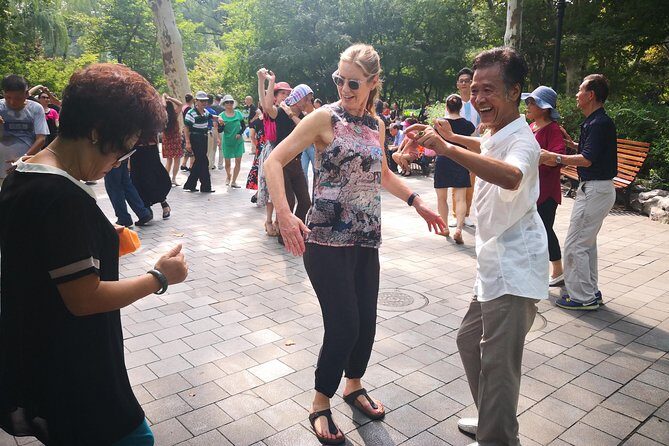 HuangPu River Ferry Boat & Highlights Bike Tour With Local Lunch - The Scenic Route: From the Bund to Lujiazui