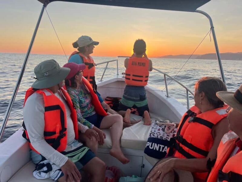 Huatulco: Sunset on a boat in the ocean - Key Points
