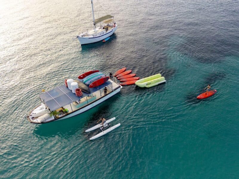 Ibiza: Sunset Boat Tour with Water Sports, Open Bar & Tapas - Key Points