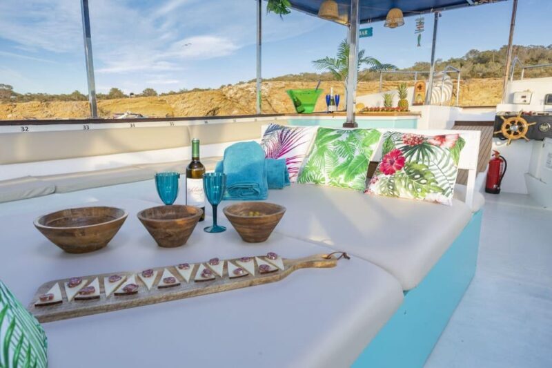 Ibiza: Sunset Boat Tour with Water Sports, Open Bar & Tapas - Authentic Voices & Real Experiences