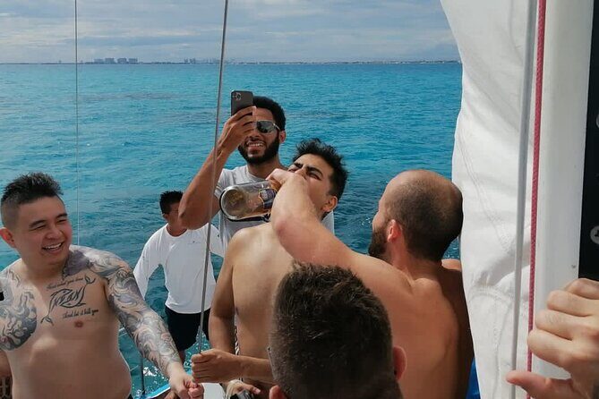 Isla Mujeres Catamaran Experience from Cancun! Unlimited drinks - Key Points