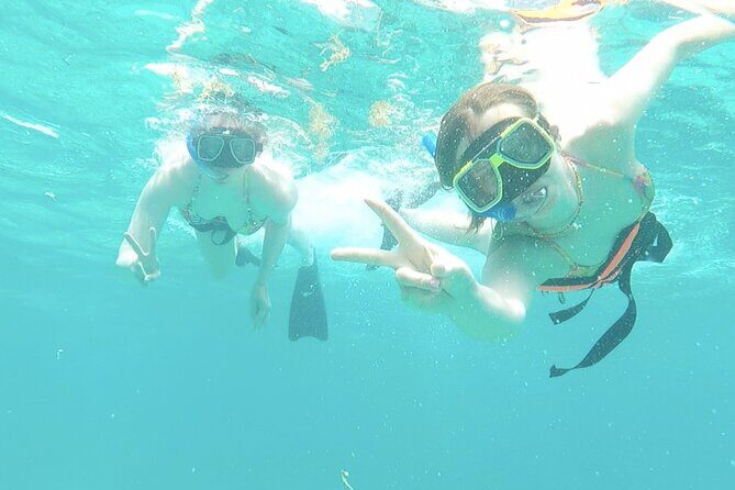 Isla Mujeres Catamaran Tour, Snorkeling, Fun, Open bar and Buffet - Beach Club and Lunch