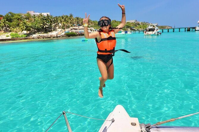 Isla Mujeres Catamaran Tour with Snorkeling, Open Bar and Buffet - The Beginning: Smooth Pick-up and Journey to the Marina