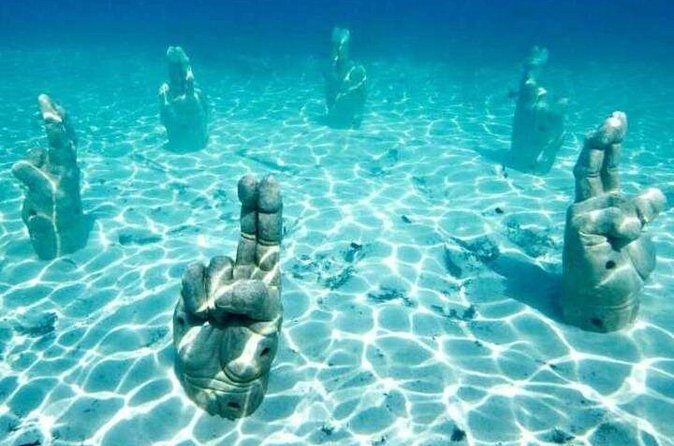 Isla Mujeres on luxury catamaran with snorkel, open bar and lunch - FAQ