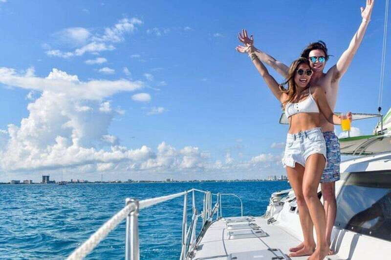 Isla Mujeres Plus Experience Catamaran Tour + Snorkel+Lunch - Key Points