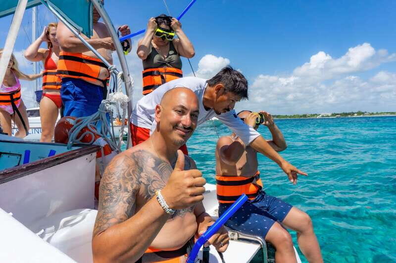 Isla Mujeres: Snorkeling Tour with Open Bar - Returning and Sunset Views