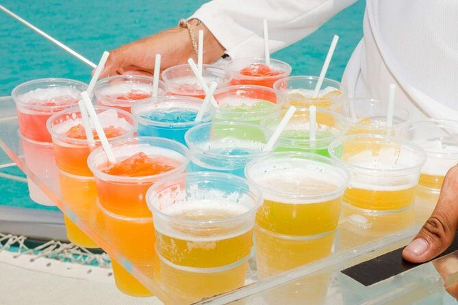 Isla Mujeres Tour on Catamaran with Snorkel, Open Bar, Buffet & Beach club - The Sum Up