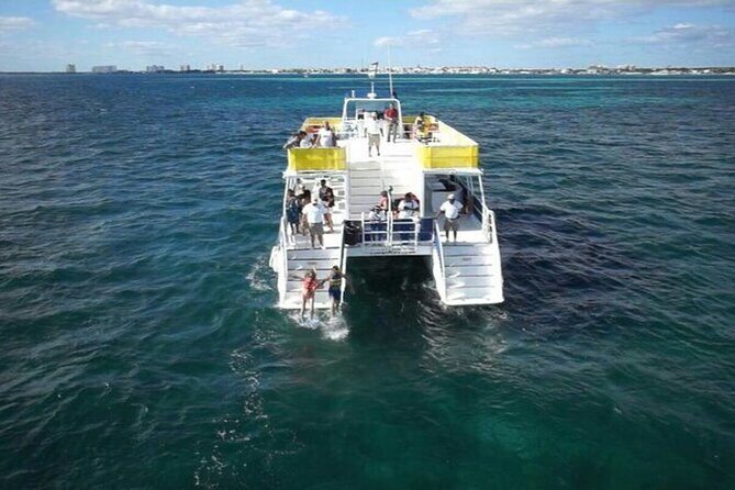 Isla Mujeres Unlimited Catamaran! Drinks, Fun & Party From Playa Del Carmen - The Experience Begins: Pickup and Journey