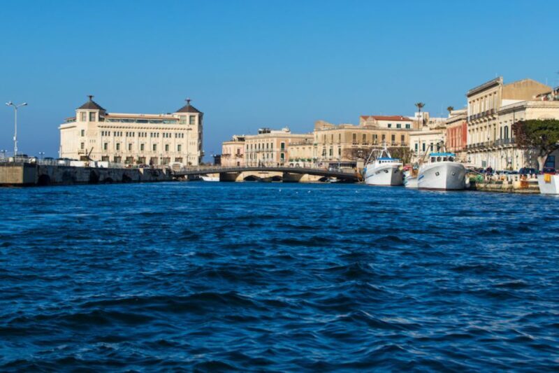 Island of Ortigia: Sunset Boat Tour with Aperitif - An Authentic Sicilian Coastline Adventure