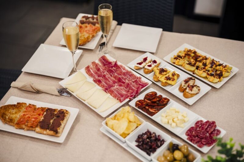 Jamon & Tapas Tasting Experience near Sagrada Familia - Detailed Breakdown of the Itinerary