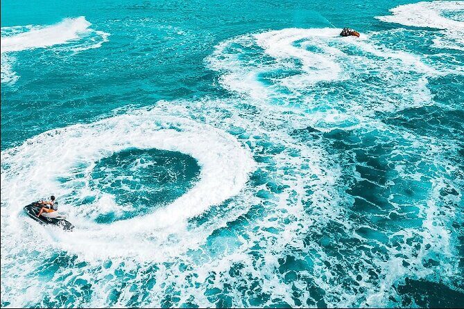 Jet Skiing around La famille ship and smaller pristine cays - The Experience Breakdown: What to Expect