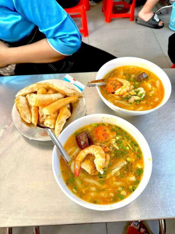KISSTOUR | Motorbike Food Tour Female Drivers in Ho Chi Minh - Riding Through the City’s Contrasts